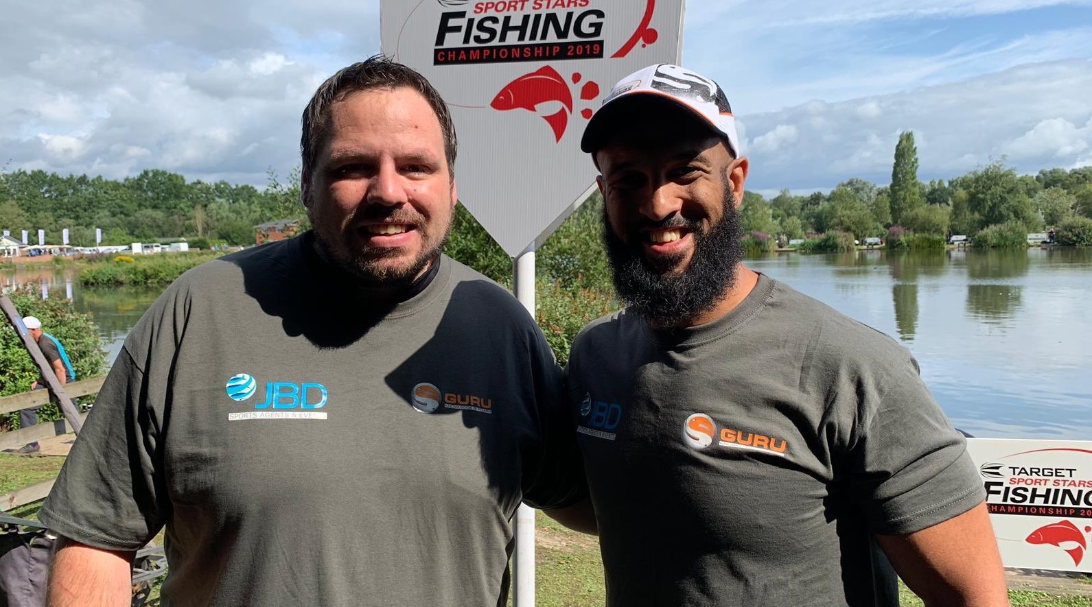 Lewis shines as charity fishing event raises £15,000 | PDC