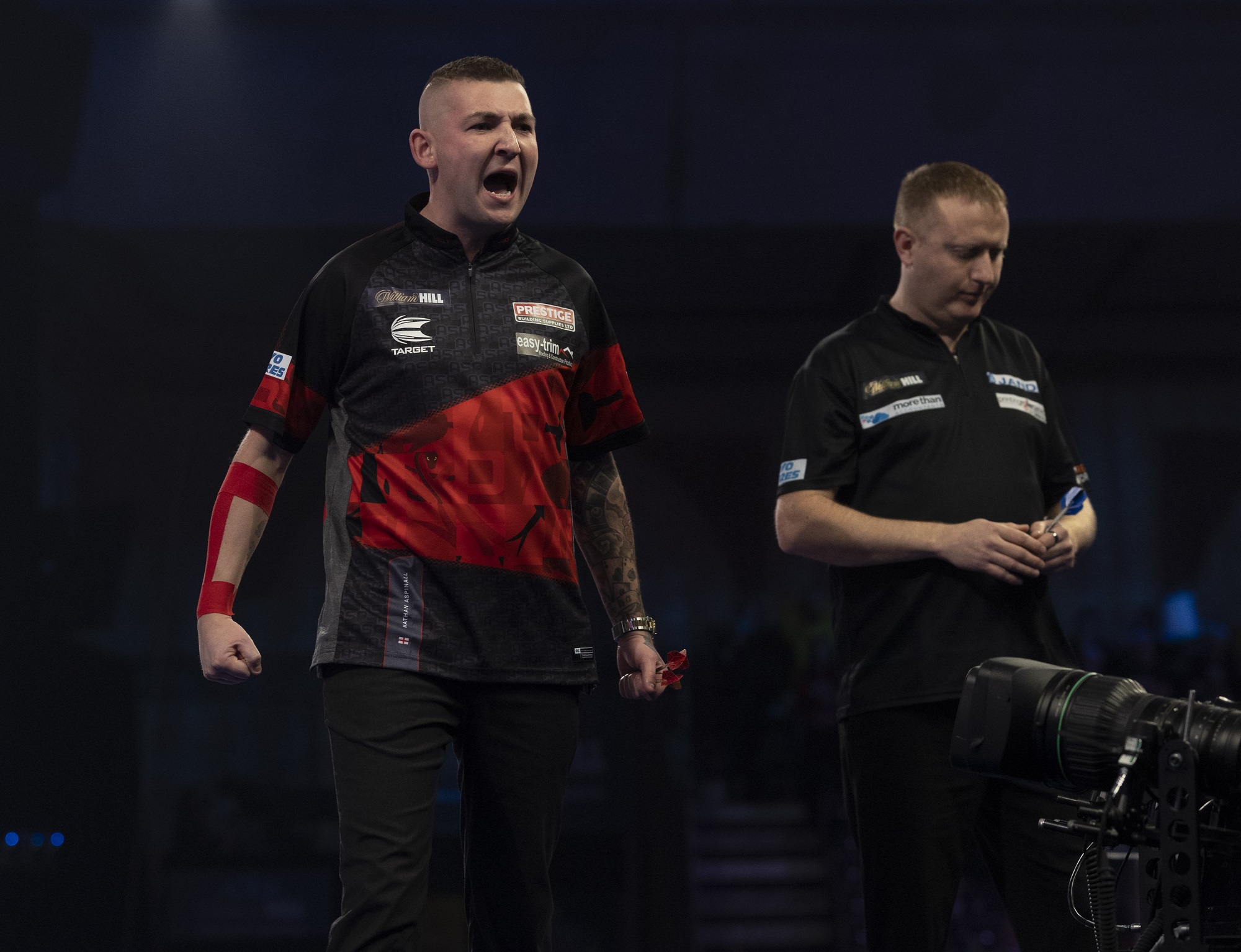Aspinall survives scare to advance to round three | PDC