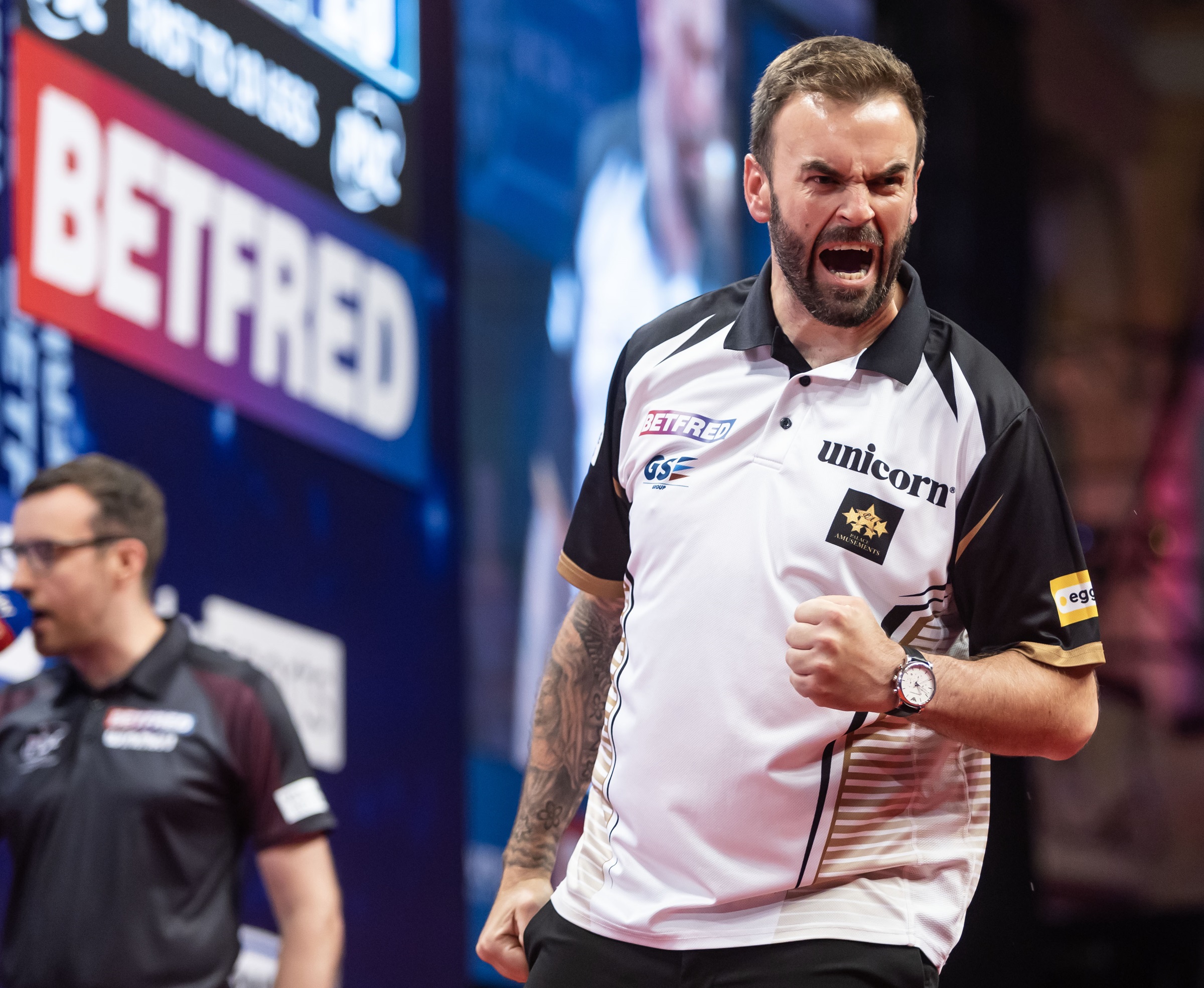 Resilient Smith denies nine-dart Rock to win PC29 | PDC